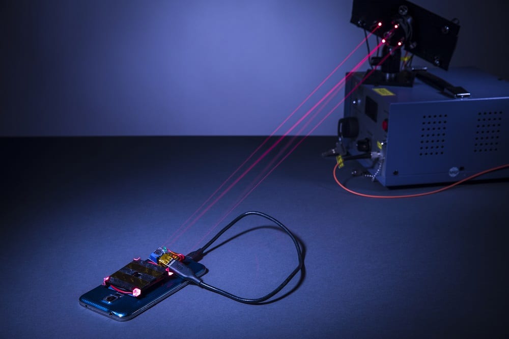 Using a Laser to Wirelessly Charge a Smartphone Safely Across a Room - News